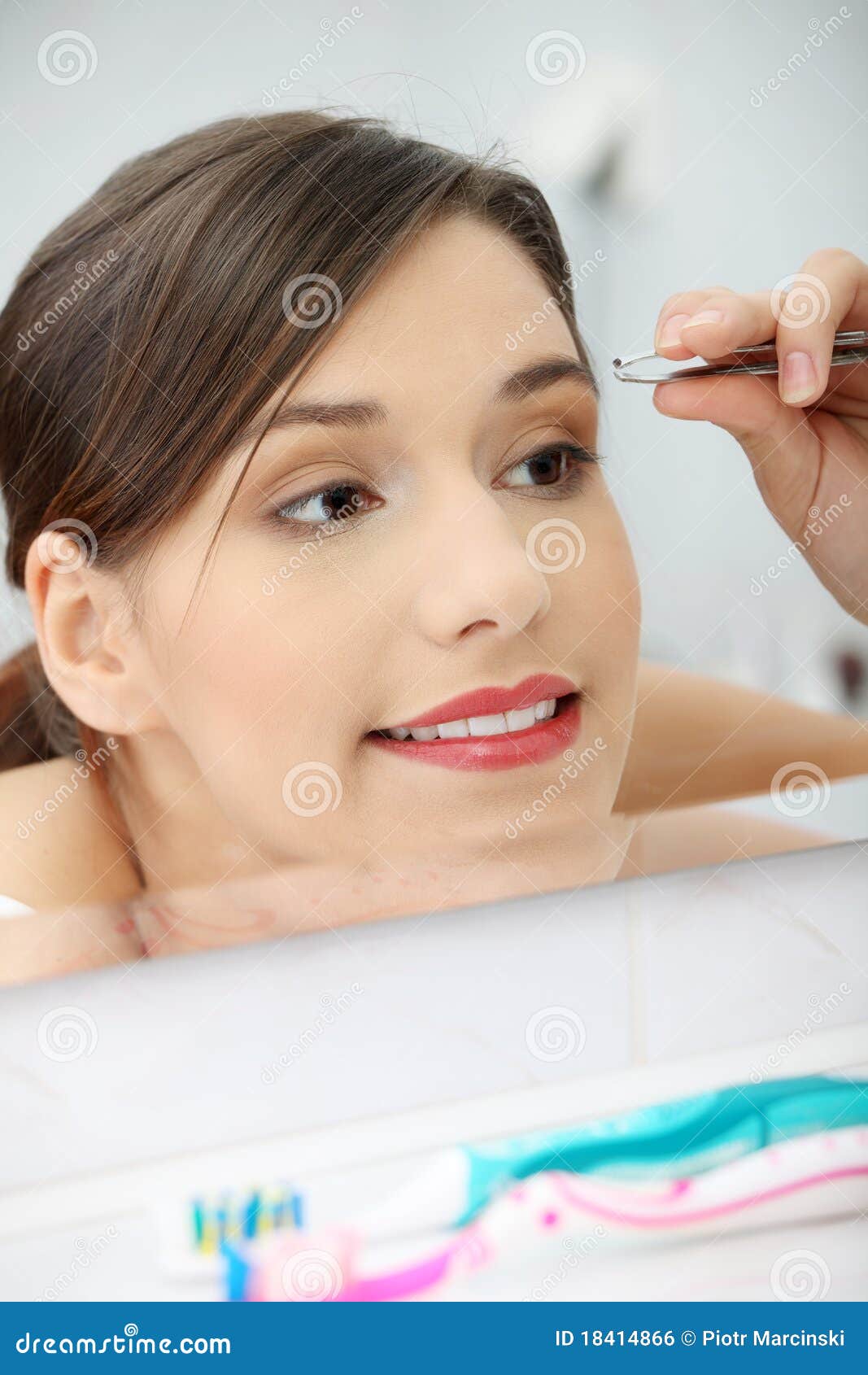 Woman Plucking Her Eyebrows Stock Photography | CartoonDealer.com #20008760