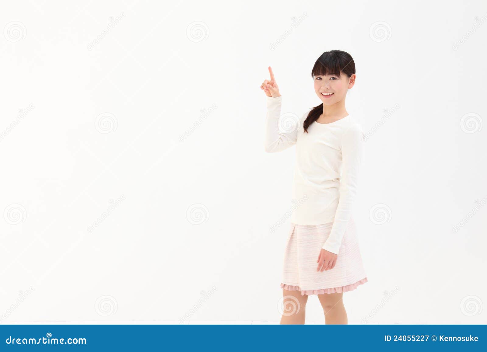 Young woman pointing stock image. Image of isolated, oriental - 24055227