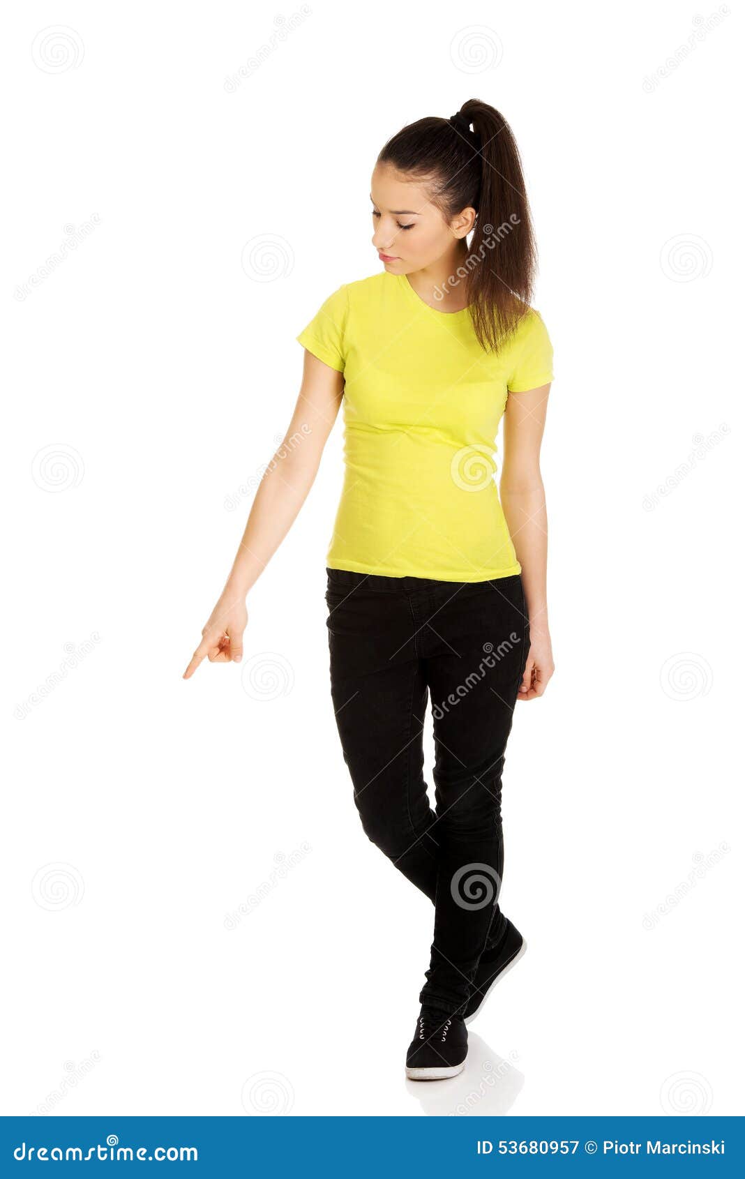 Young woman pointing down. stock image. Image of adult - 53680957