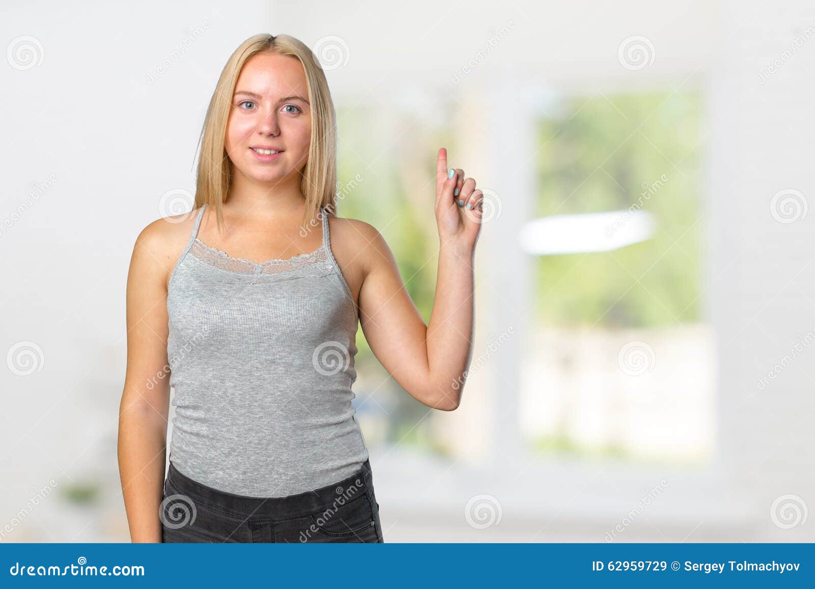 Young Woman Pointing Finger Up Stock Image - Image of advertising ... Young Woman Pointing Finger Up Stock Image - Image of advertising ...