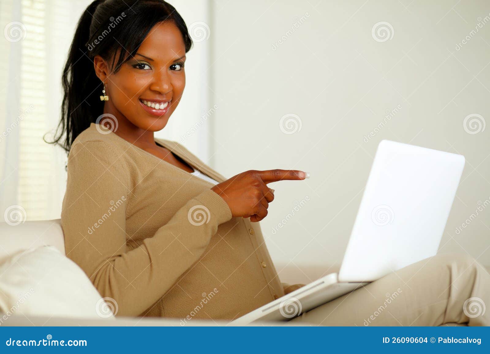 Young Woman Pointing the Laptop Screen Stock Photo - Image of black ...