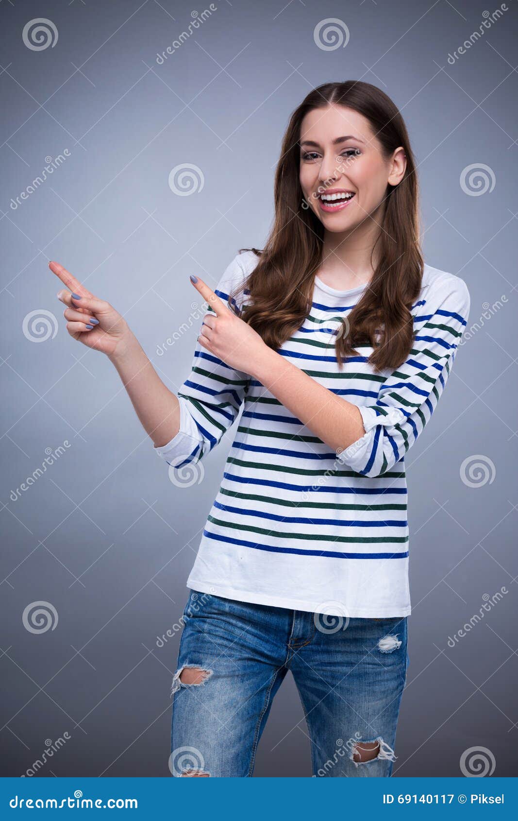 Young woman pointing stock image. Image of casual, gesturing - 69140117