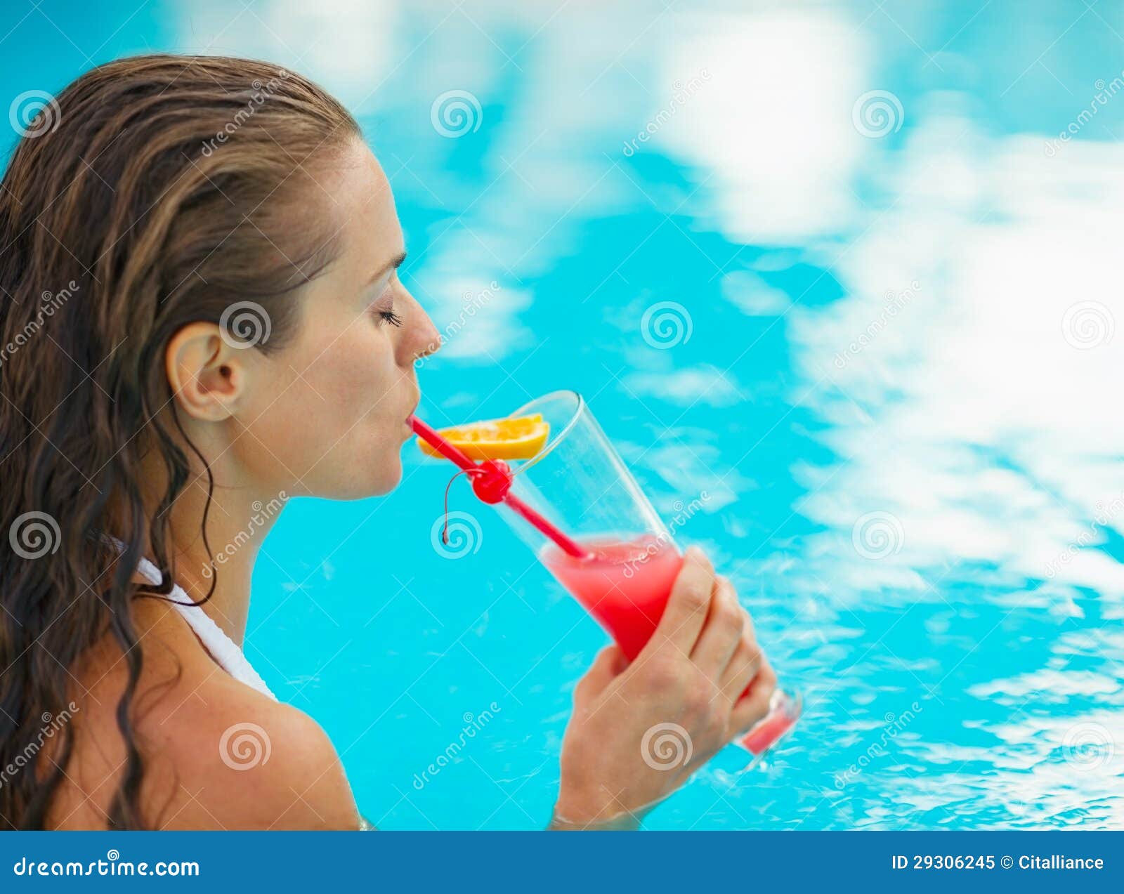 Young Woman at Pool Drinking Cocktail Stock Image - Image of brunette ...