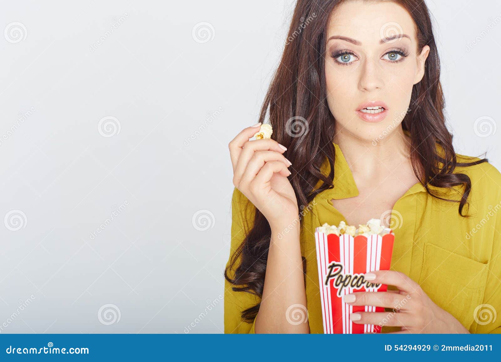 Young woman with popcorn stock image. Image of popcorn - 54294929