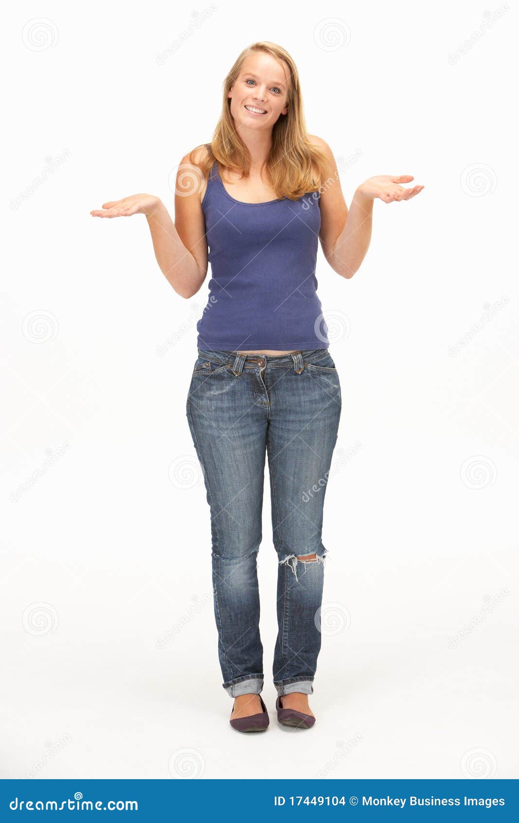 Young Woman Poses with Shrugged Shoulders Stock Photo - Image of person ...