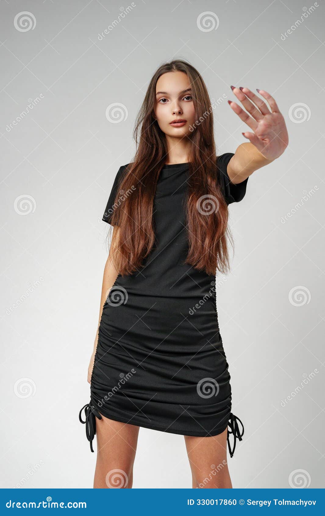 Young Woman Posing with Hand Raised Sign Stock Photo - Image of young ...