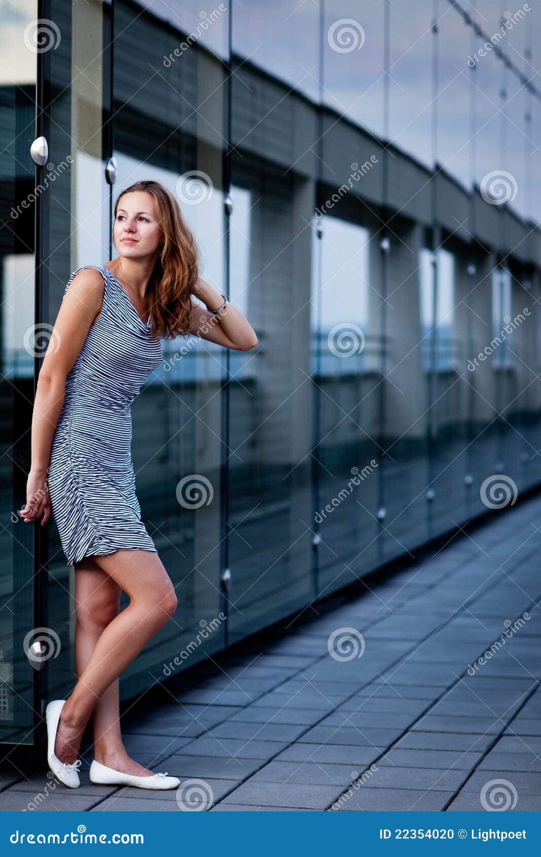 Young Woman Posing Inside a Modern Building Stock Photo - Image of ...