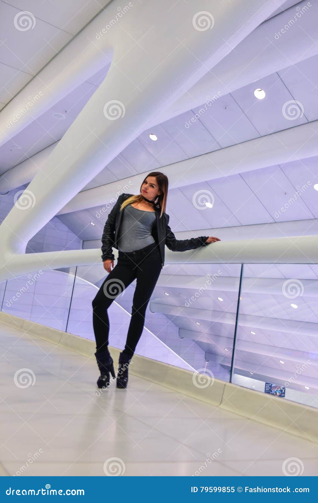 Young Woman Posing in the Modern Architectural Building. Stock Image ...