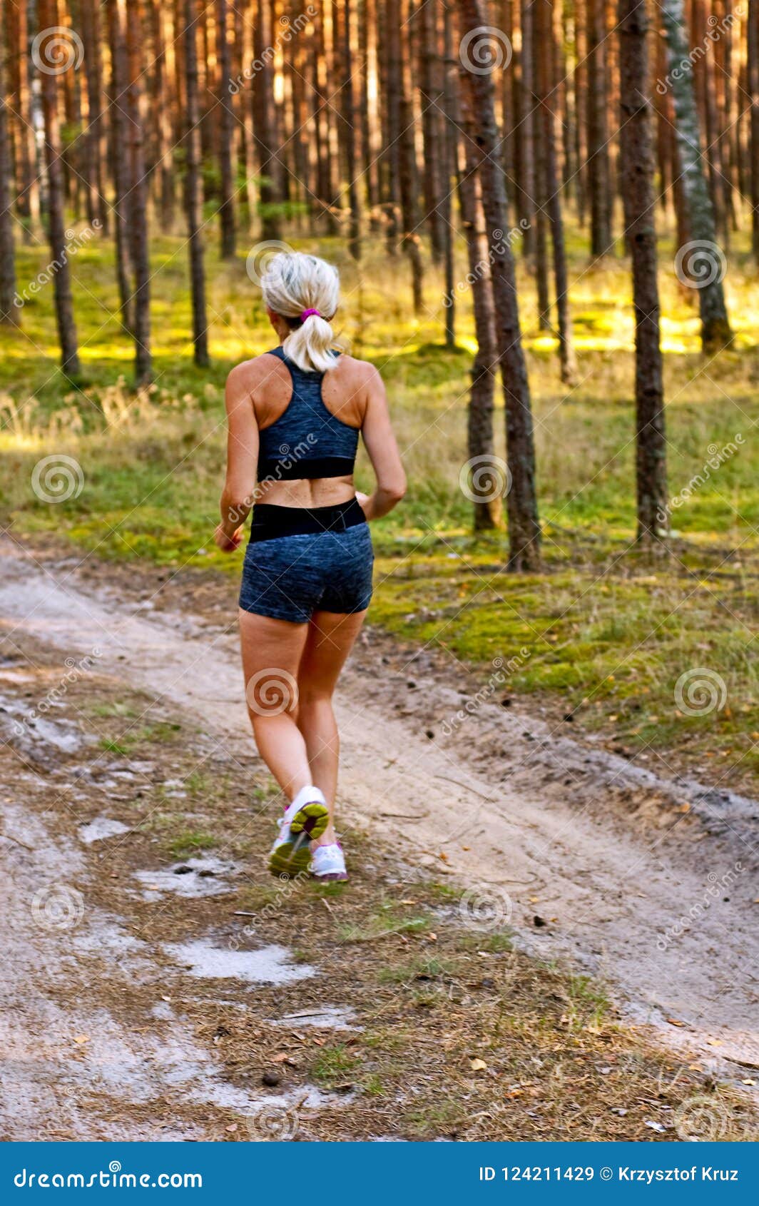 Jogging in the woods stock image. Image of fitness, female - 124211429
