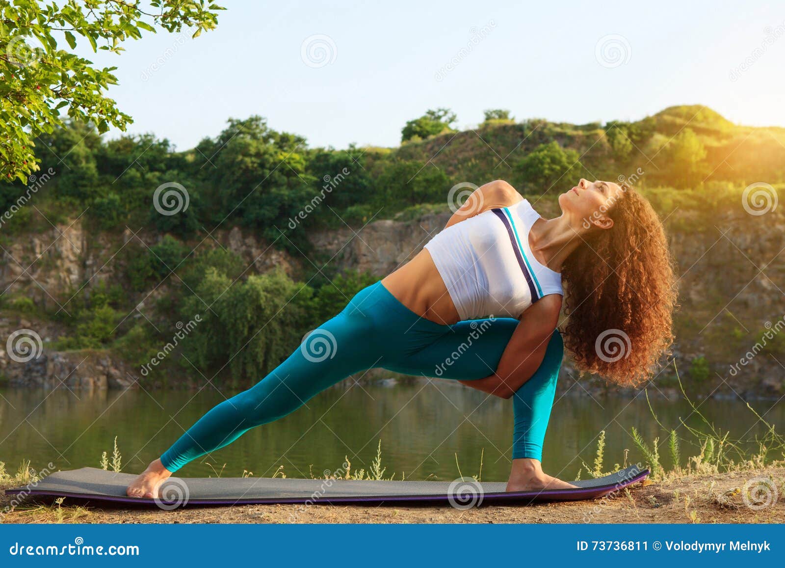 Young Woman is Practicing Yoga Near River Stock Image - Image of ...