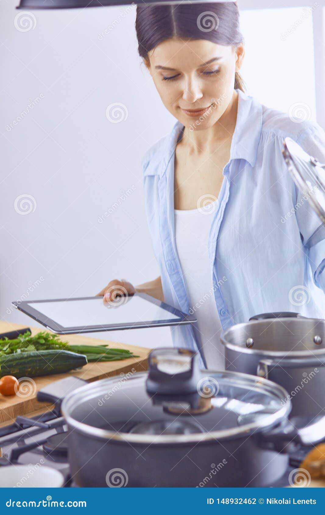 A Young Woman Prepares Food In The Kitchen Healthy Food Vegetable
