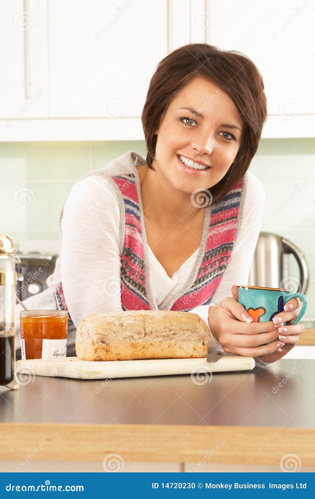 Young Woman Preparing Breakfast in Kitchen Stock Photo - Image of ...