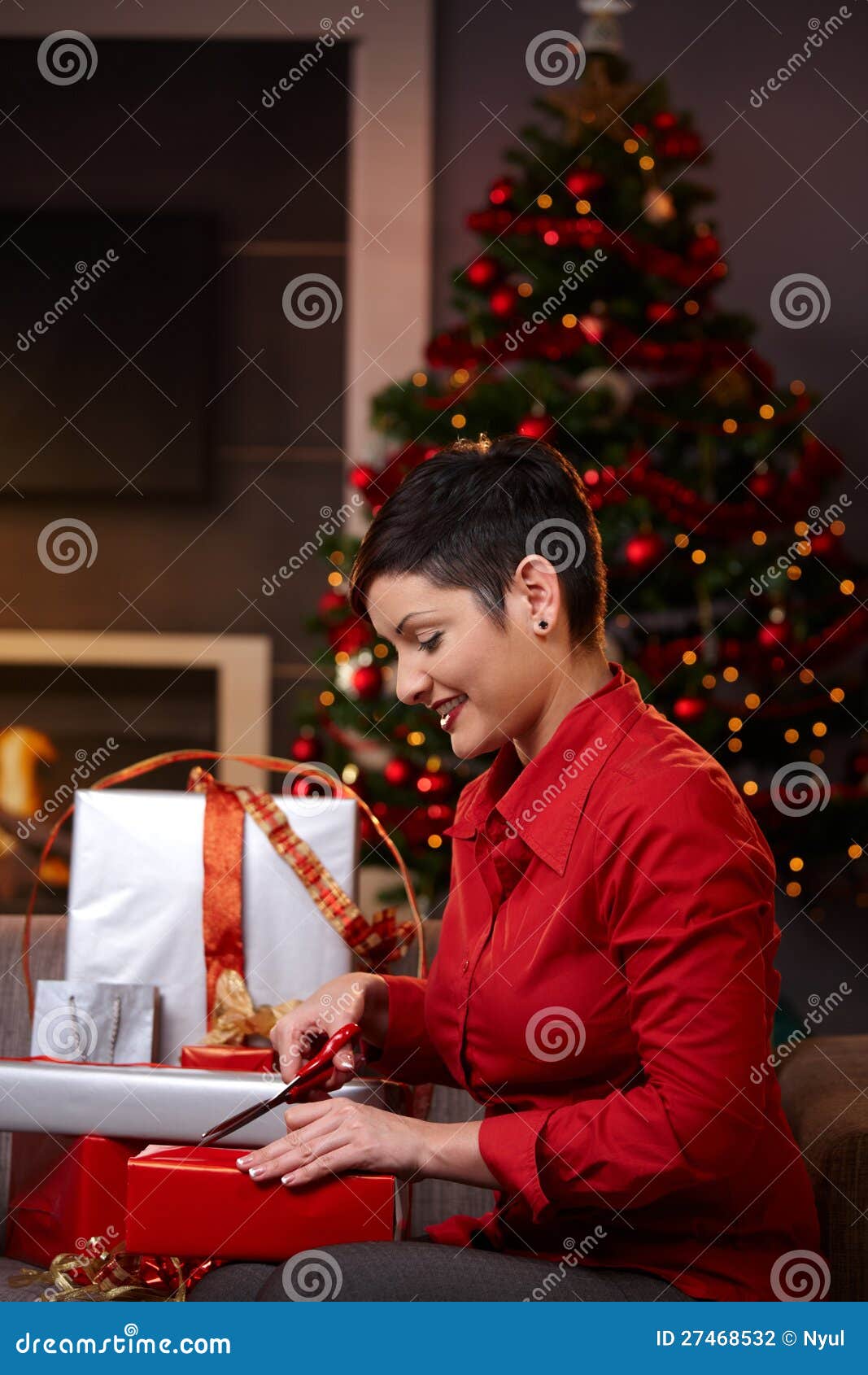 Young Woman Preparing for Christmas Eve Stock Photo - Image of alone ...