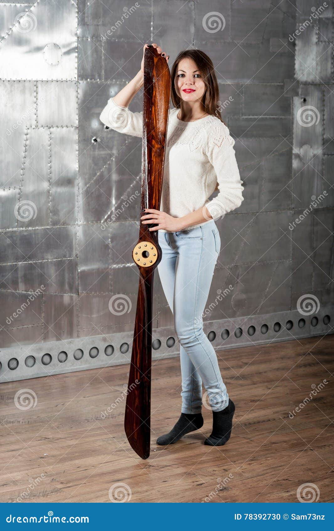 Young woman with propeller stock photo. Image of pattern - 78392730