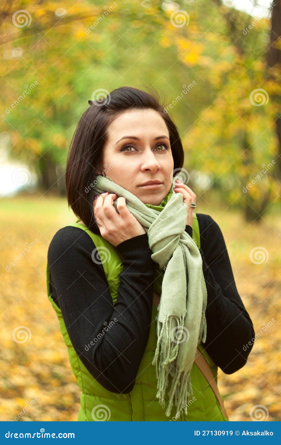 Young Woman Pulling Her Scarf Stock Image - Image of beautiful, person ...