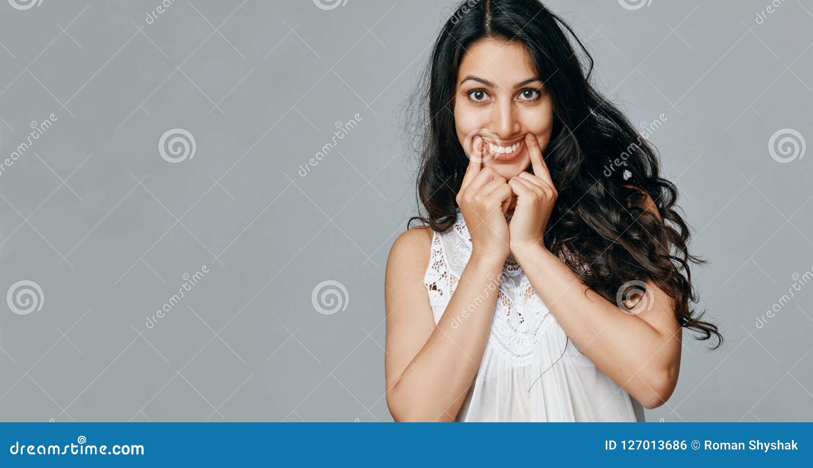 Young Woman Pulls a Smile. Concept about Mental Problems Stock Photo ...