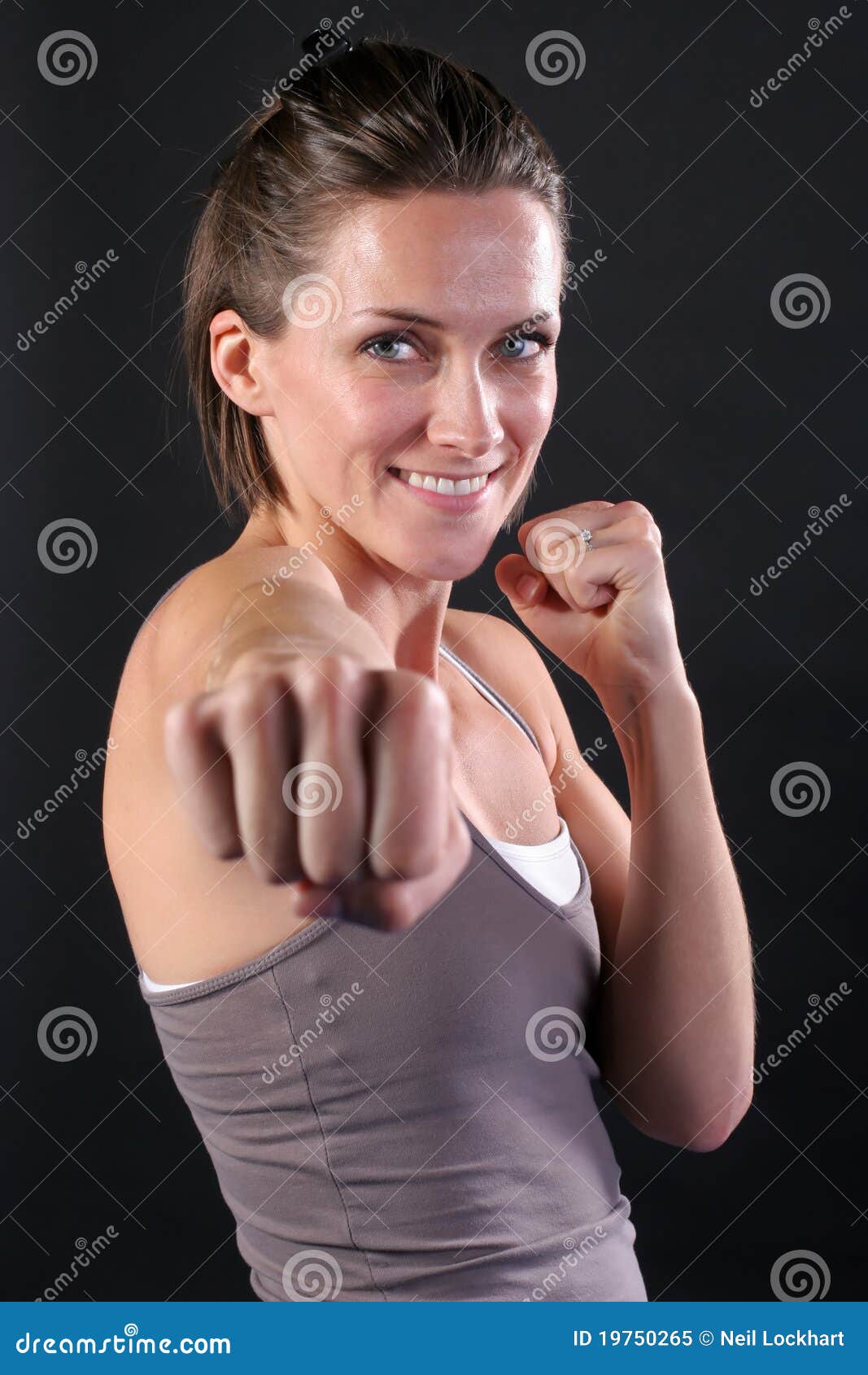 Young Woman Punching stock image. Image of combat, healthy - 19750265