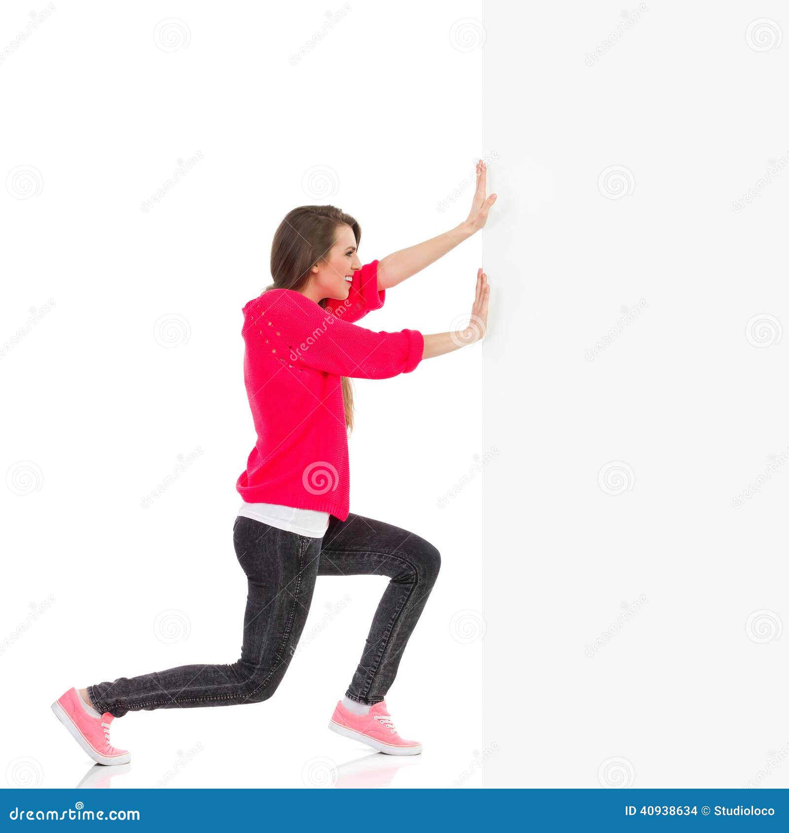 Young Woman Pushing The Wall Stock Photo - Image: 40938634