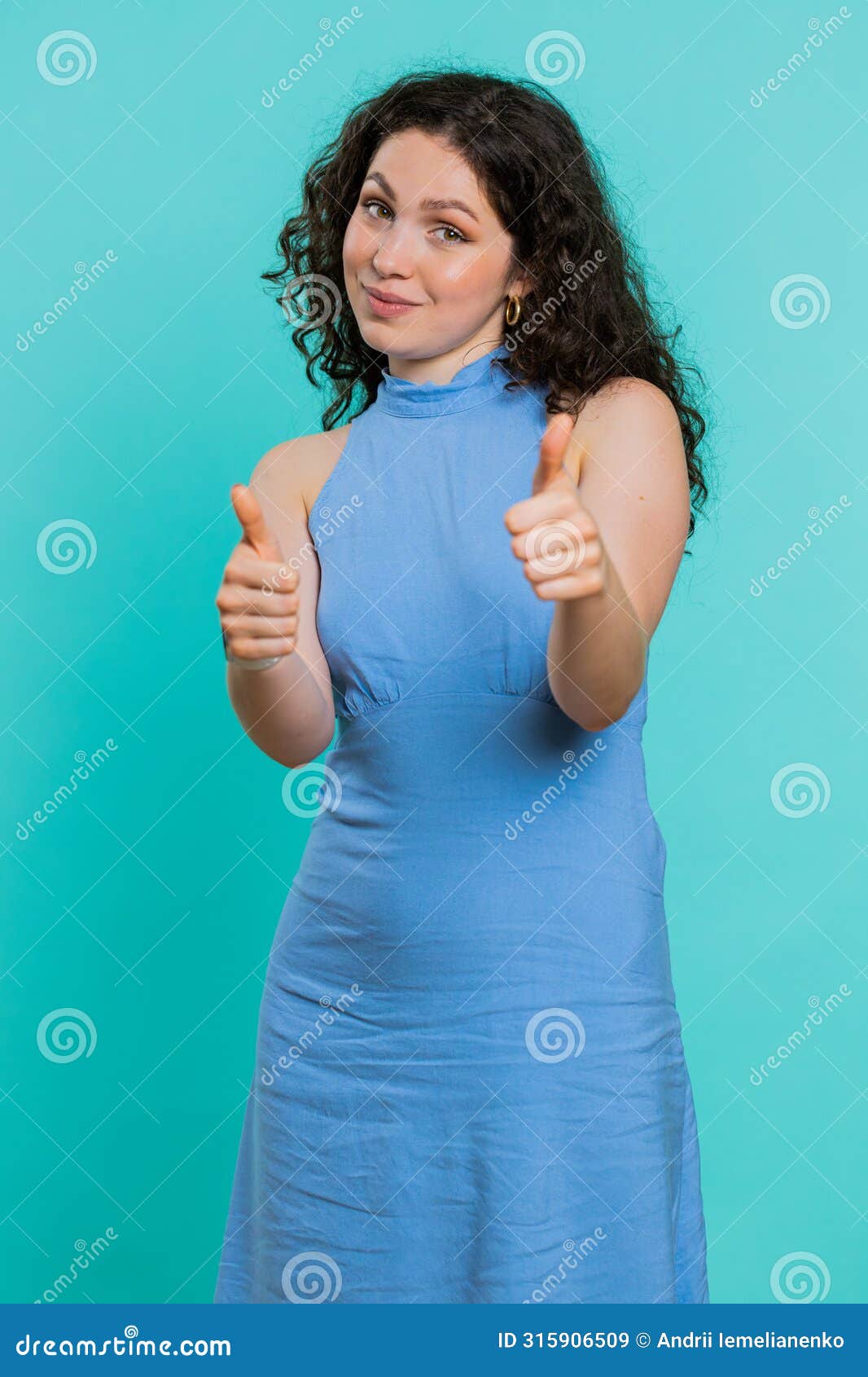 Young Woman Raises Thumbs Up Agrees Or Gives Positive Reply Recommends