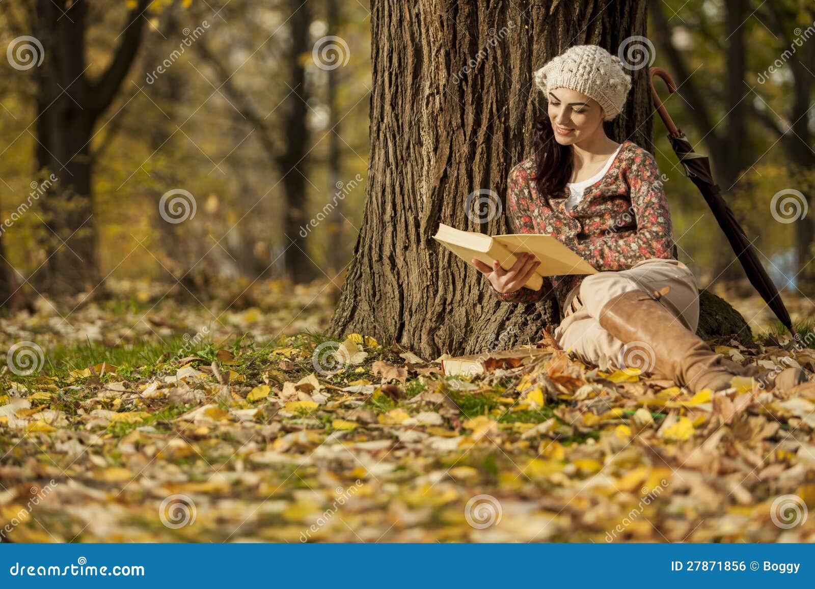 Young Woman Reading in the Autumn Forest Stock Photo - Image of leaves ...