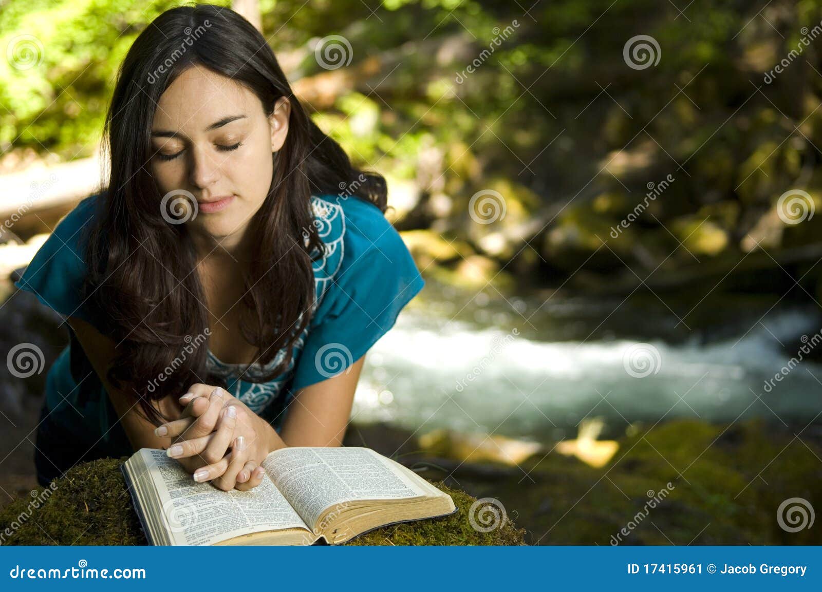 Young woman reading bible stock image. Image of praising - 17415961