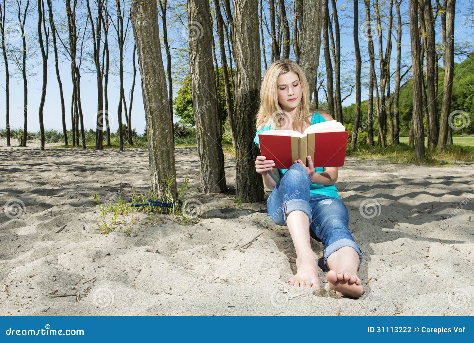 Young Woman Reading Book on Beach Stock Photo - Image of relax ...