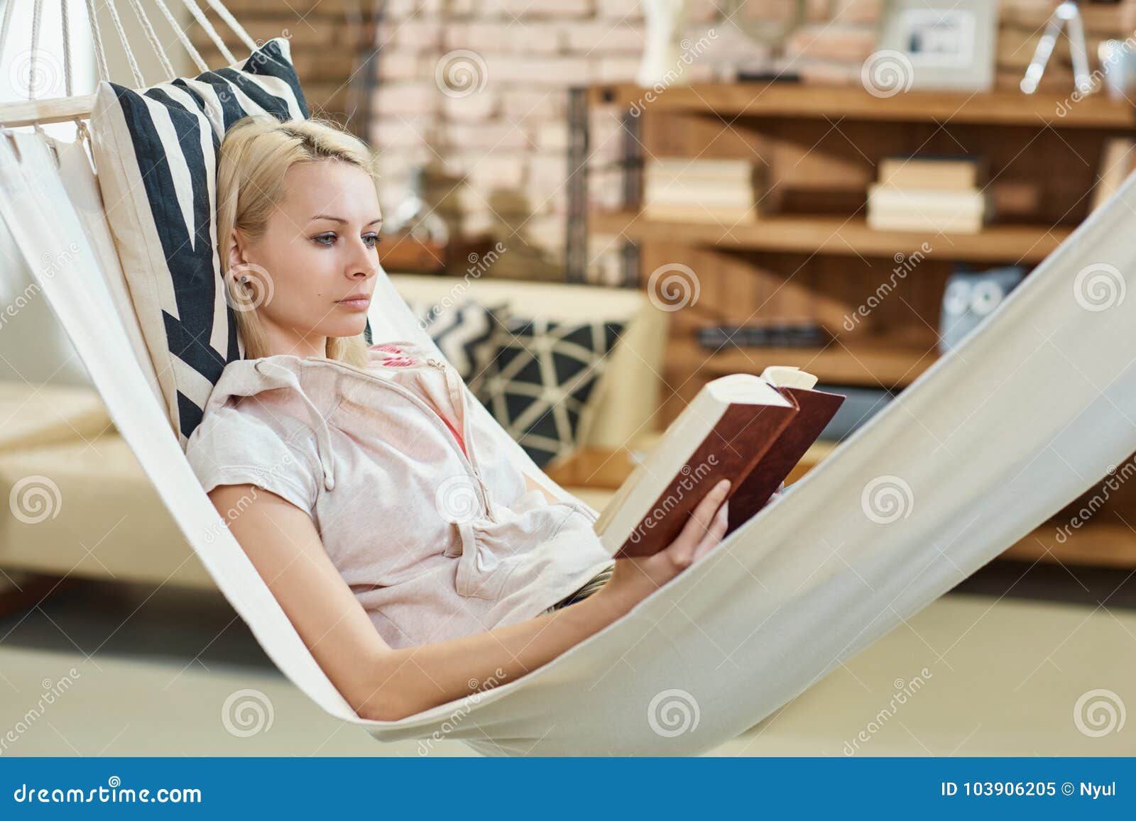 Young Woman Reading a Book in Hammock Stock Image - Image of enjoyment ...