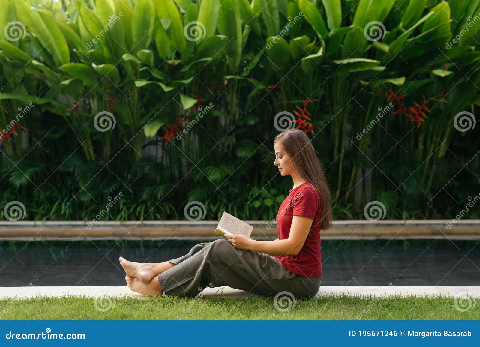 Young Woman Reading a Book by the Pool Stock Photo - Image of face ...