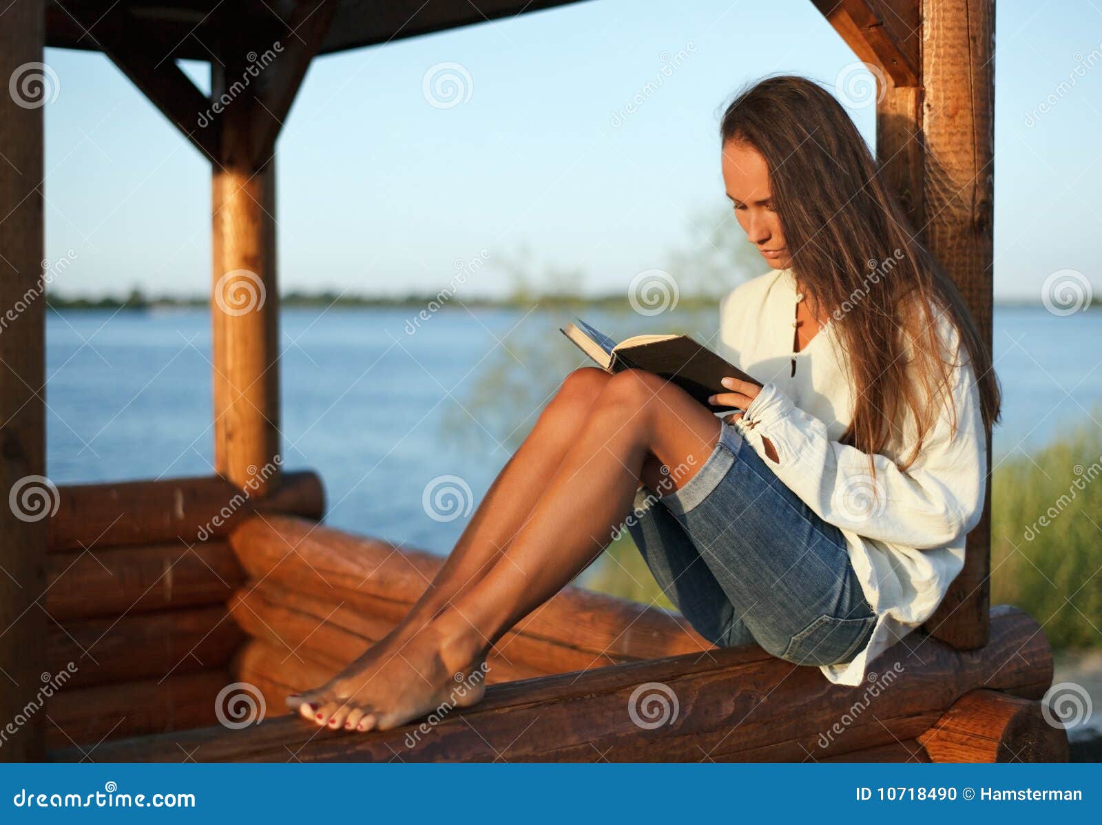 Young Woman Reading Book on Sunset Stock Photo - Image of autumn ...