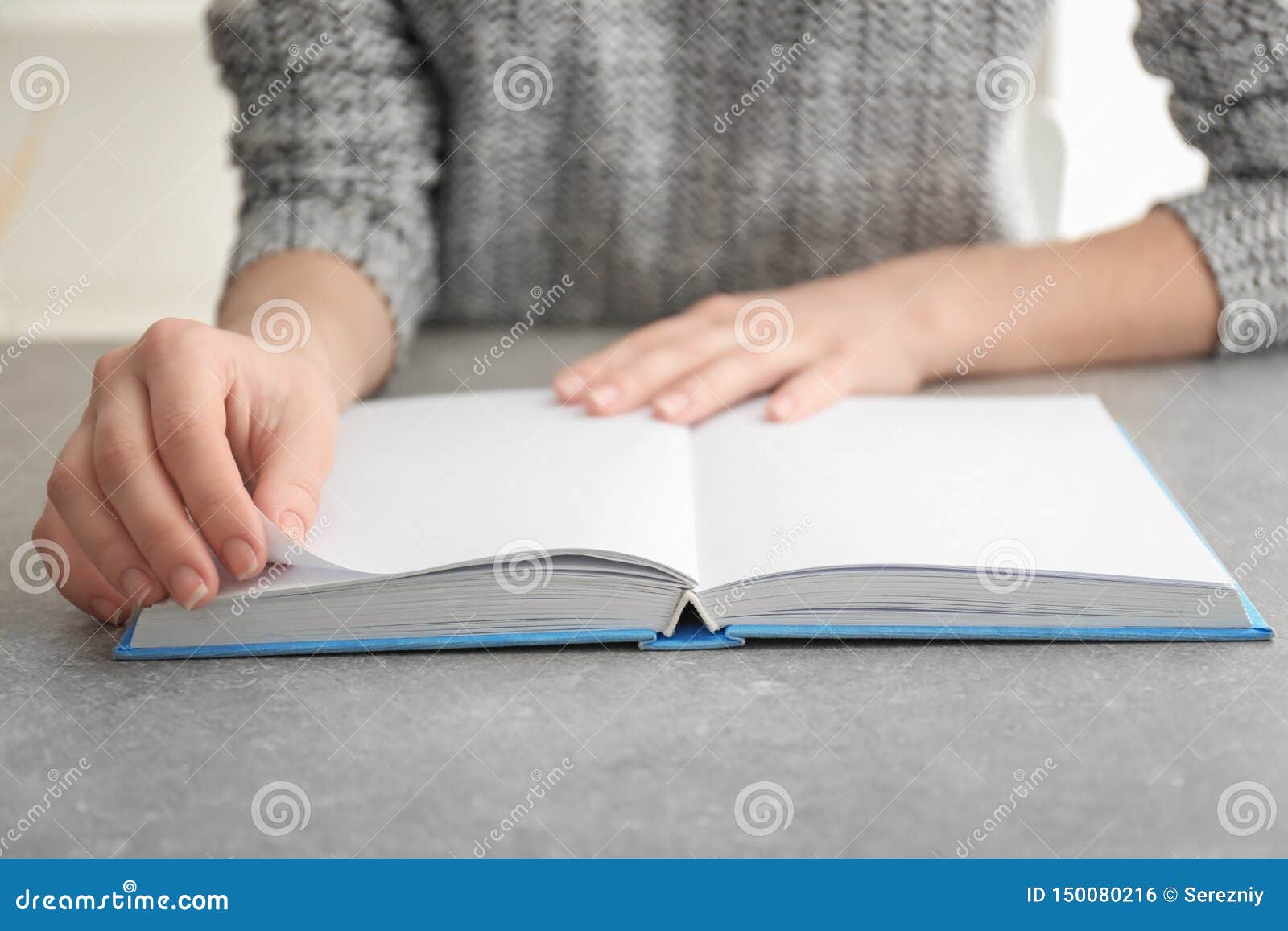 Young Woman Reading Book at Table, Closeup Stock Photo - Image of smart ...