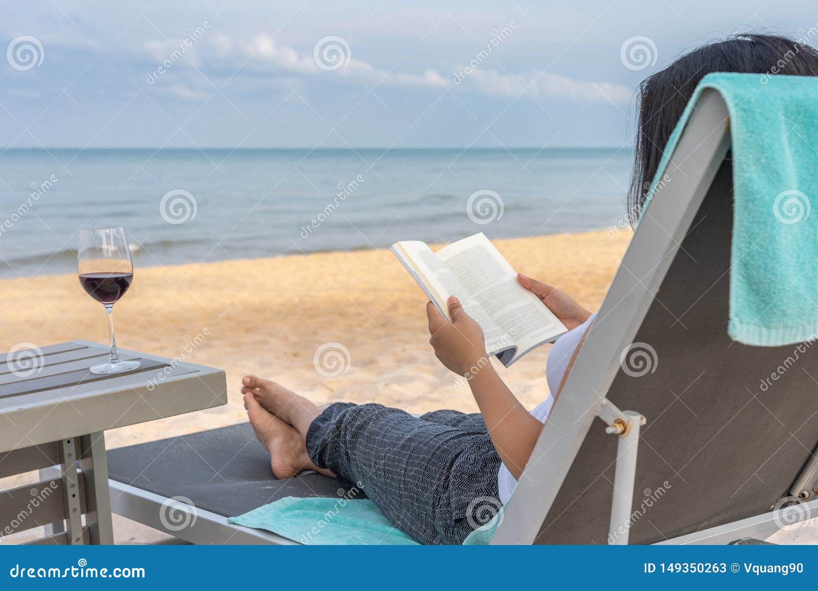Woman Reading Books on the Peaceful Beach Stock Image - Image of ...