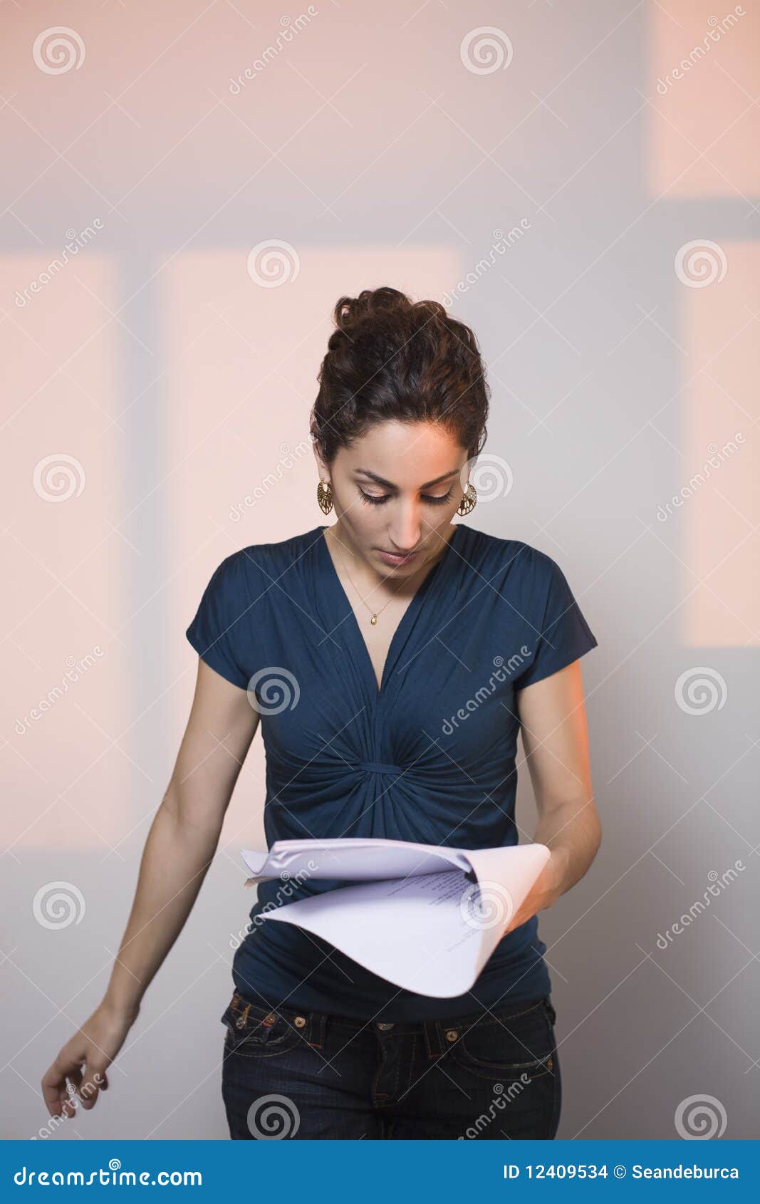 Young Woman Reading Document Stock Photo - Image of expression, paper ...