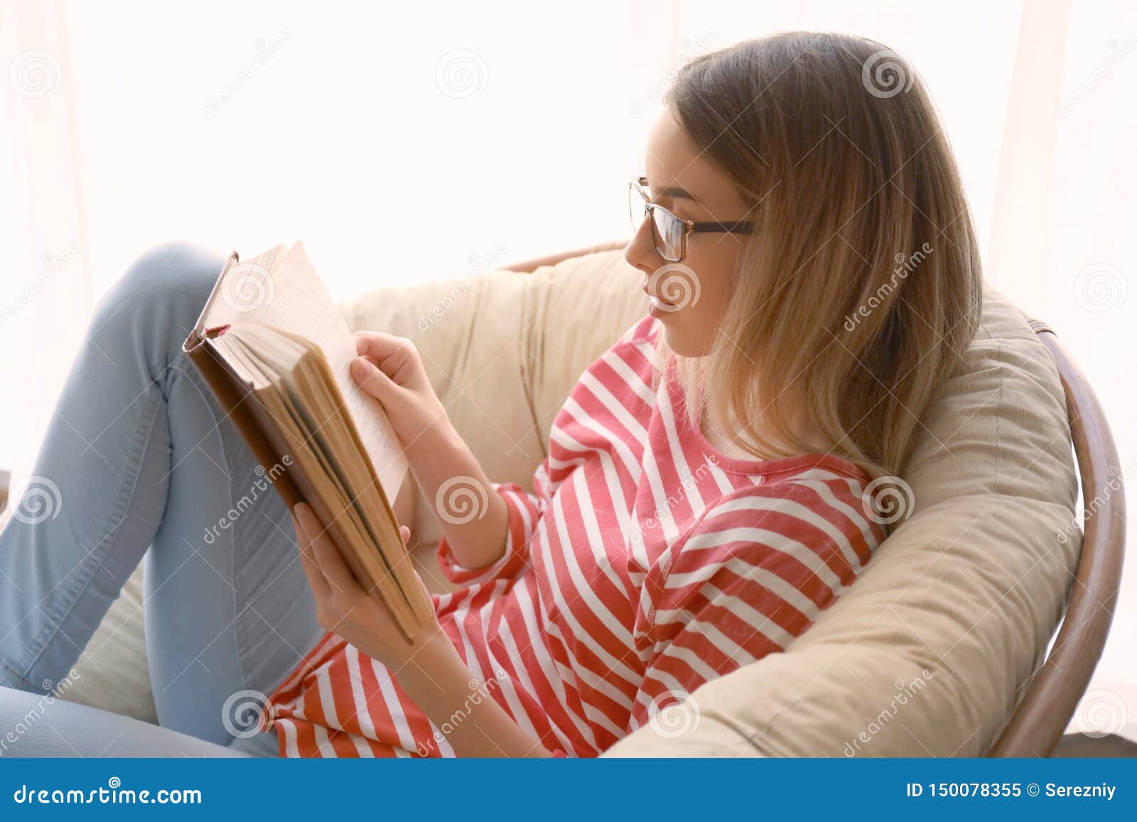 Young Woman Reading Interesting Book at Home Stock Image - Image of ...