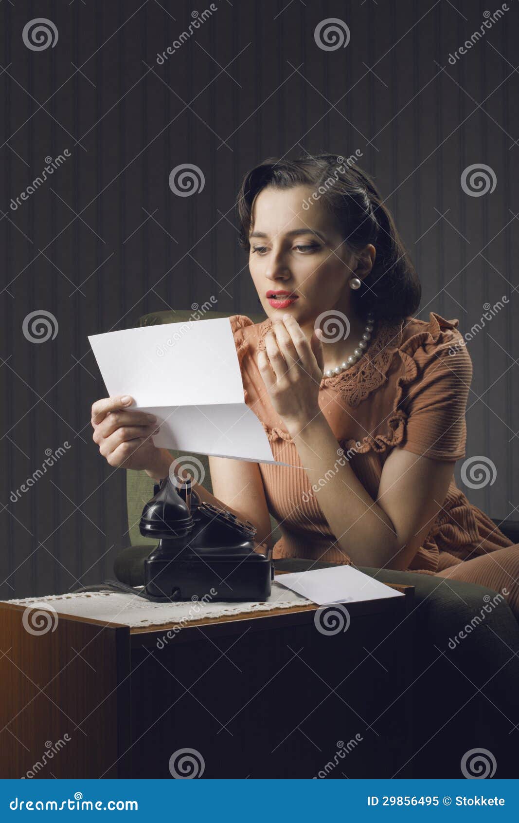 Woman Reading A Letter Sitting On Armchair Royalty-Free Stock Photo ...
