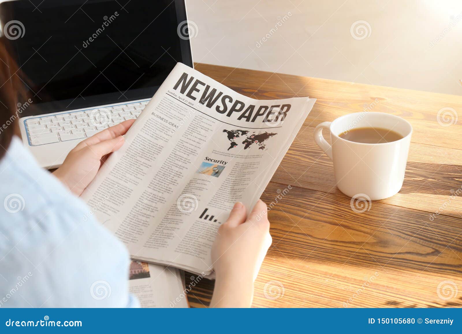 Young Woman Reading Newspaper at Table Indoors Stock Photo - Image of ...