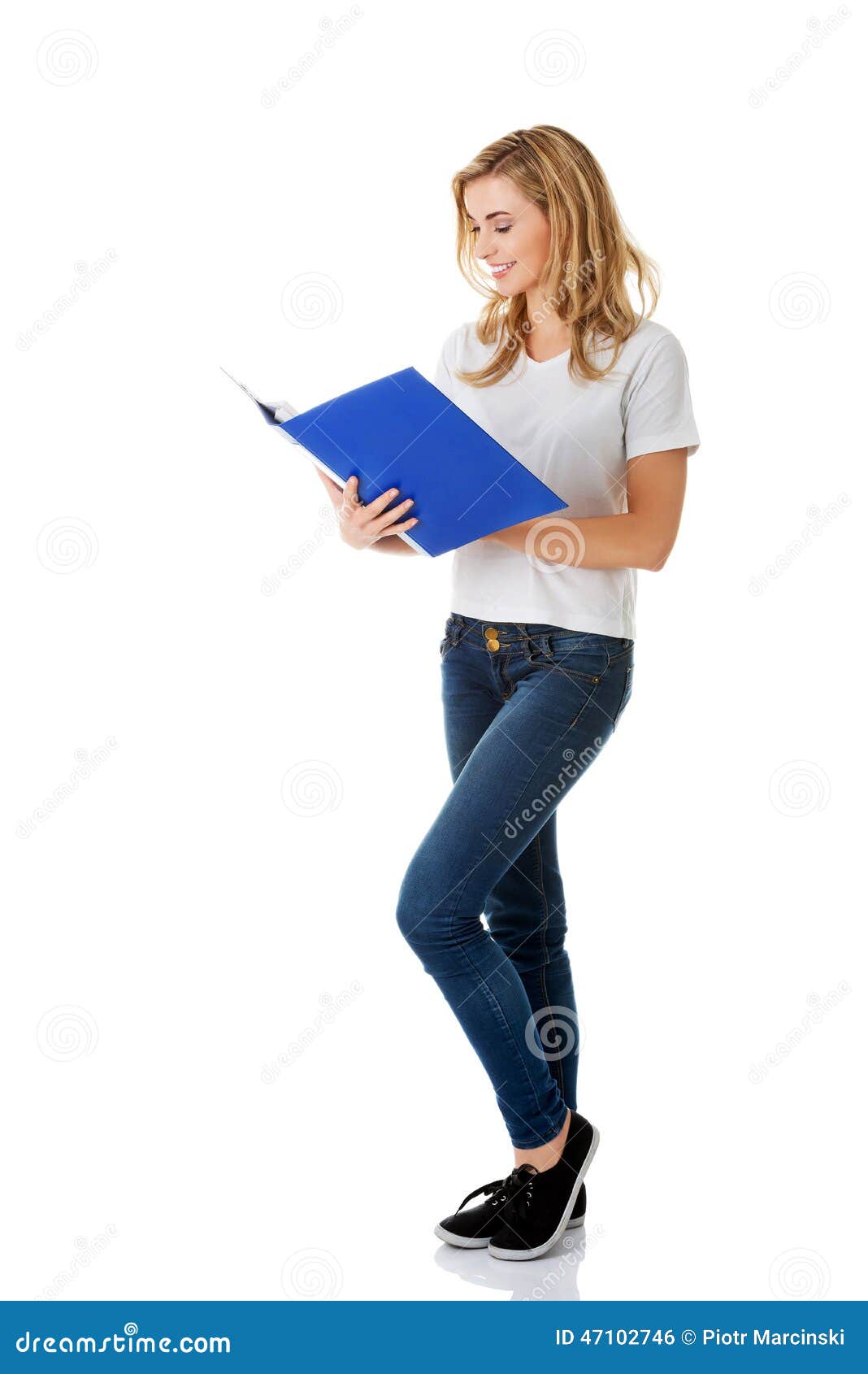 Young Woman Reading Notes in Her Binder Stock Photo - Image of chinese ...