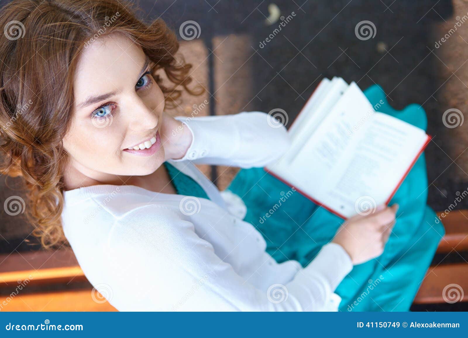 Young woman reads book. stock image. Image of looking - 41150749