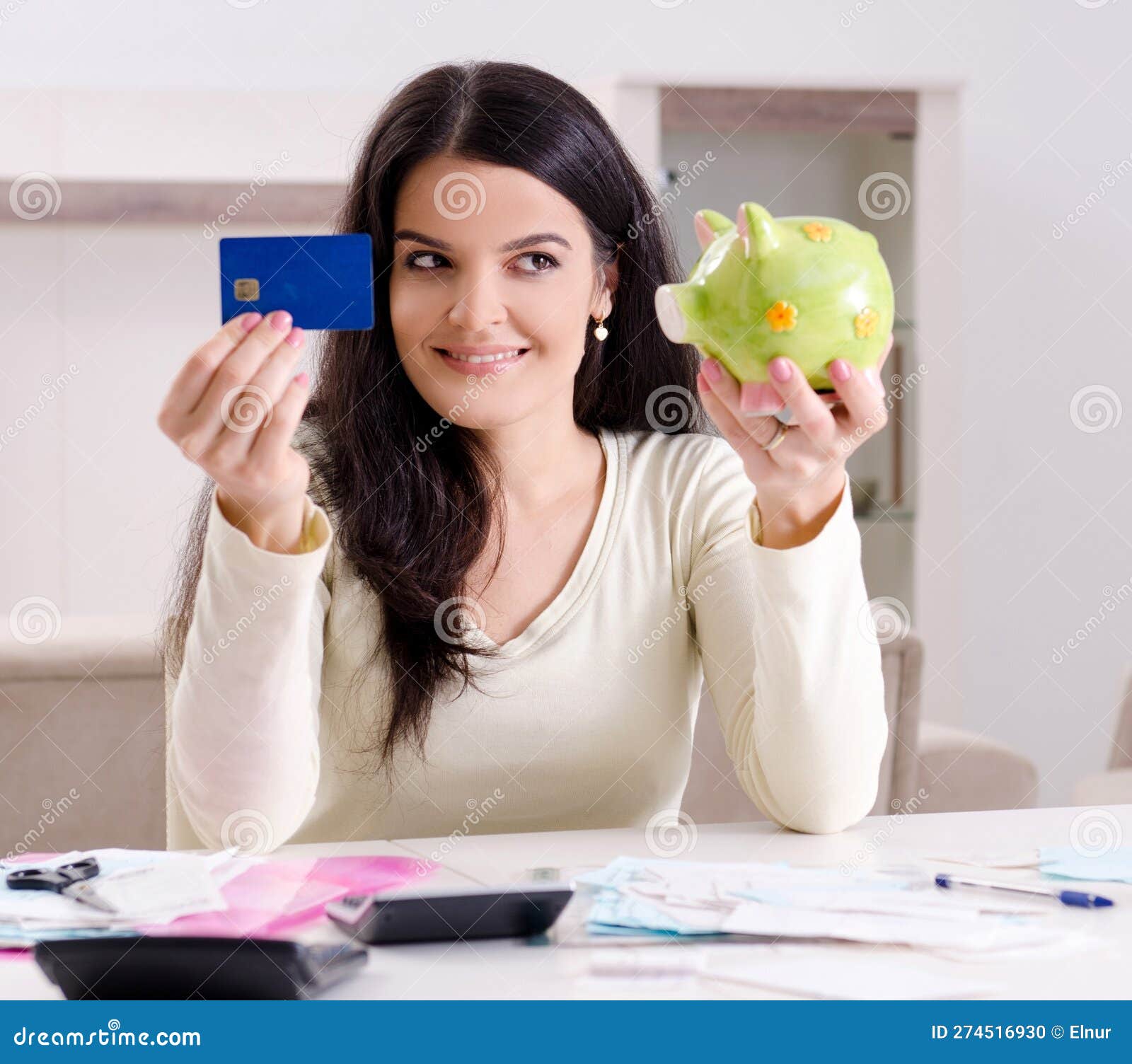 Young Woman with Receipts in Budget Planning Concept Stock Photo ...