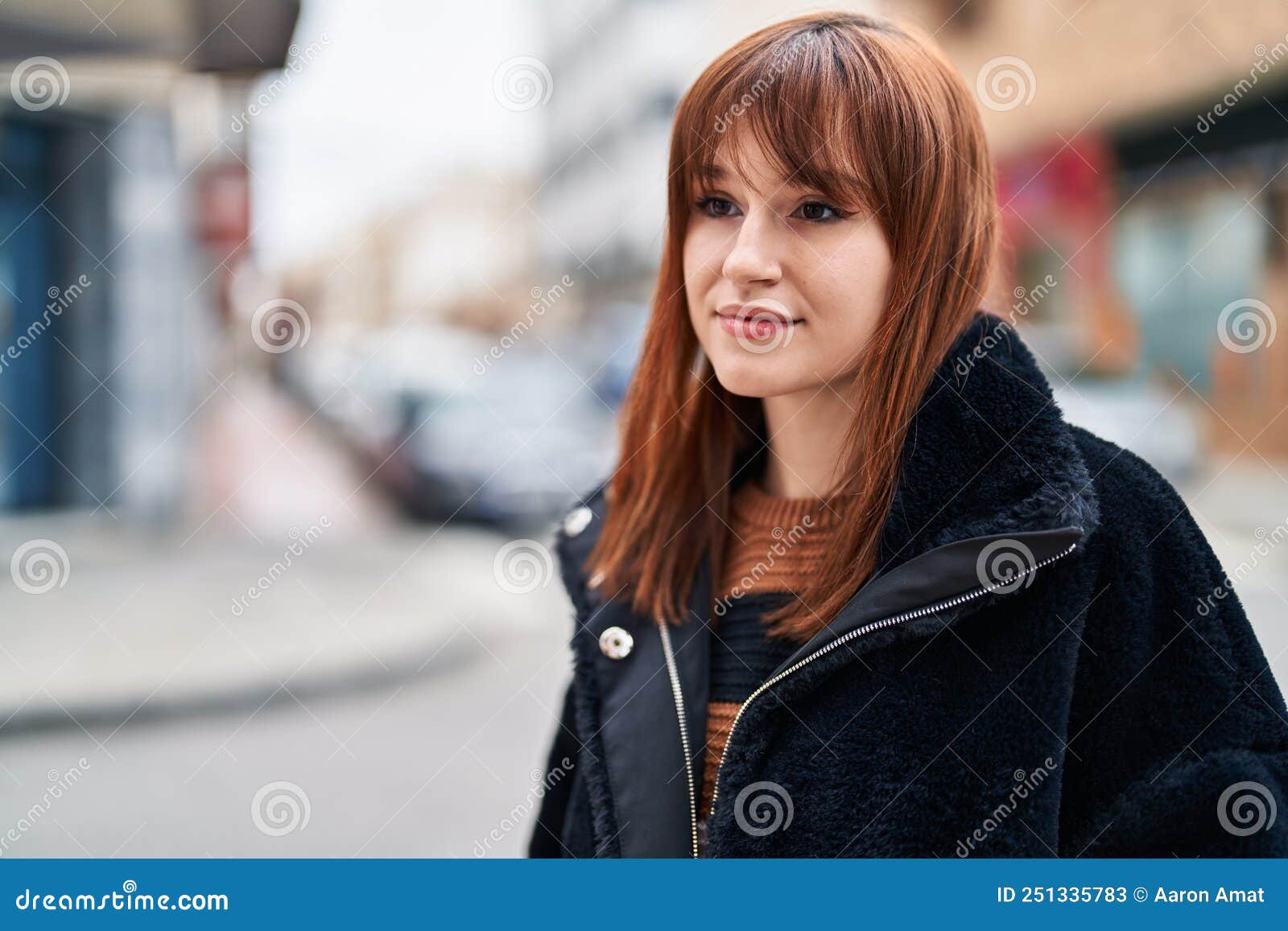 Young Woman with Relaxed Expression Standing at Street Stock Image ...