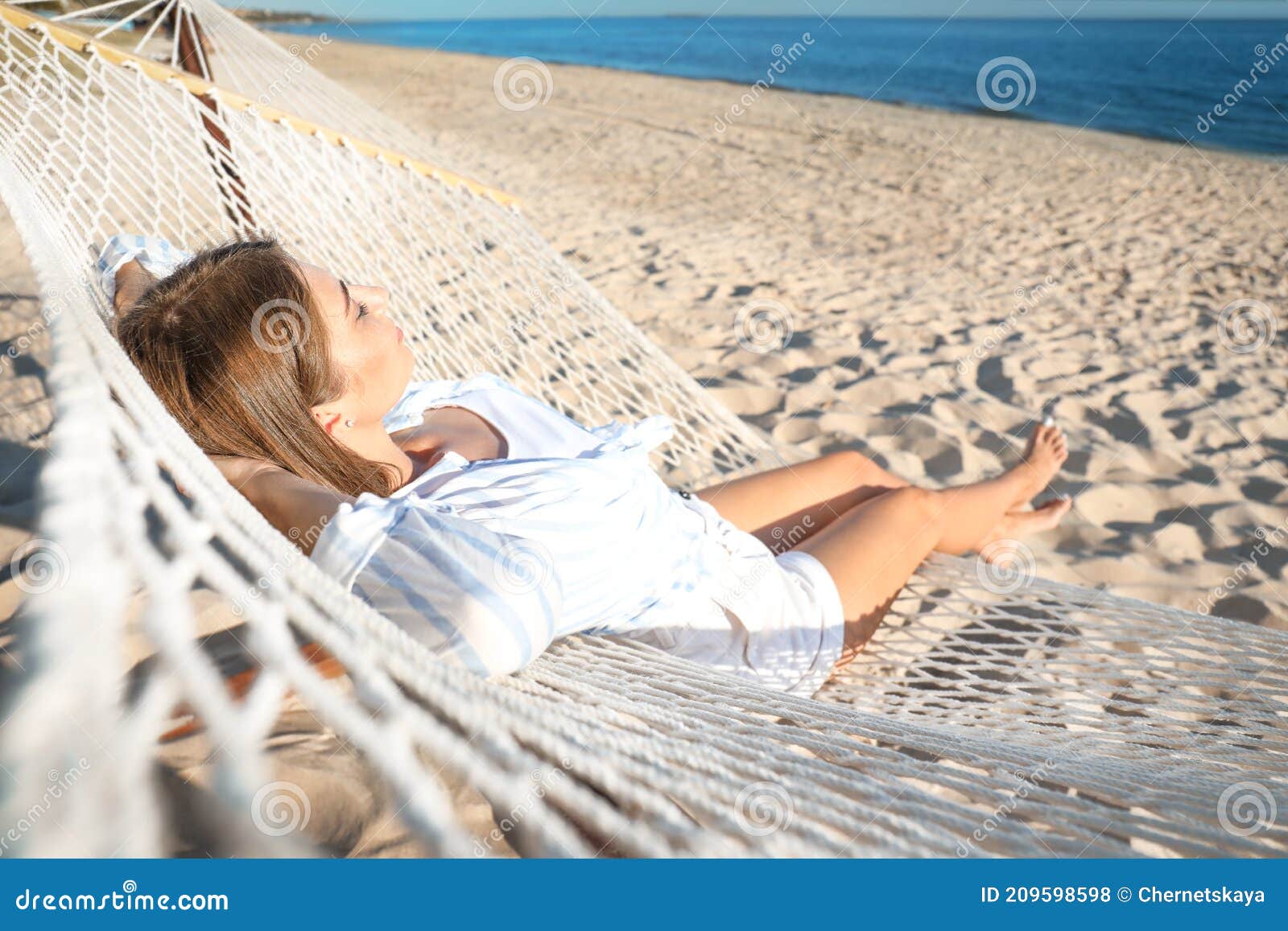 Young Woman Relaxing in Hammock on Beach Stock Photo - Image of resort ... Young Woman Relaxing in Hammock on Beach Stock Photo - Image of resort ...