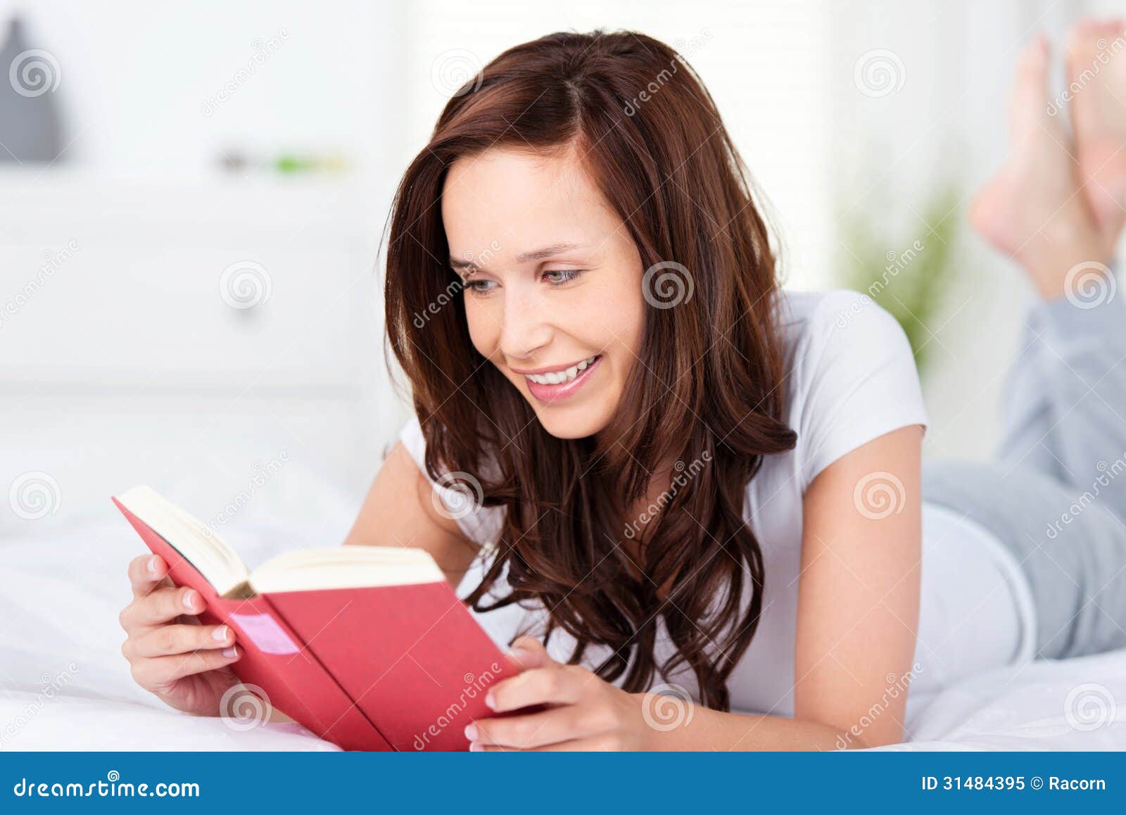 Young Woman Relaxing And Reading A Book Stock Image Image 31484395