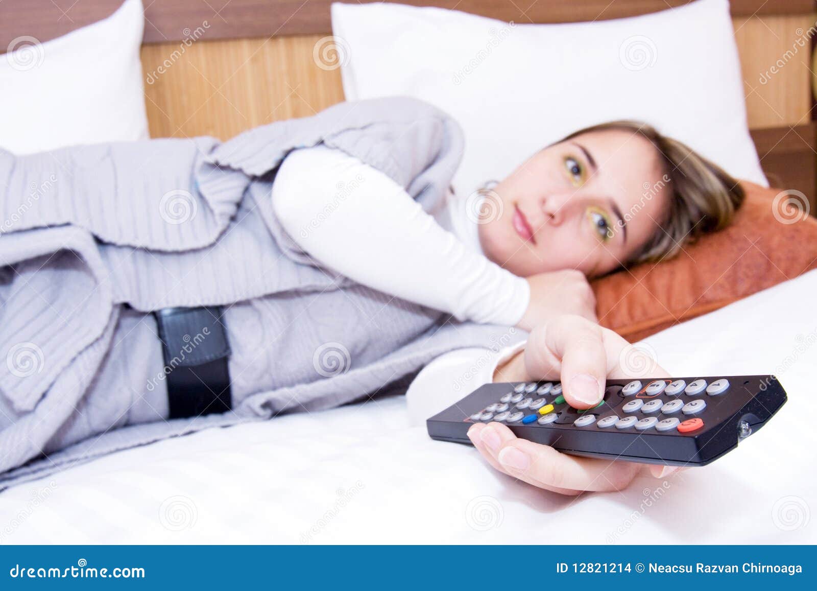 Young Woman with a Remote Control Stock Photo - Image of house ...