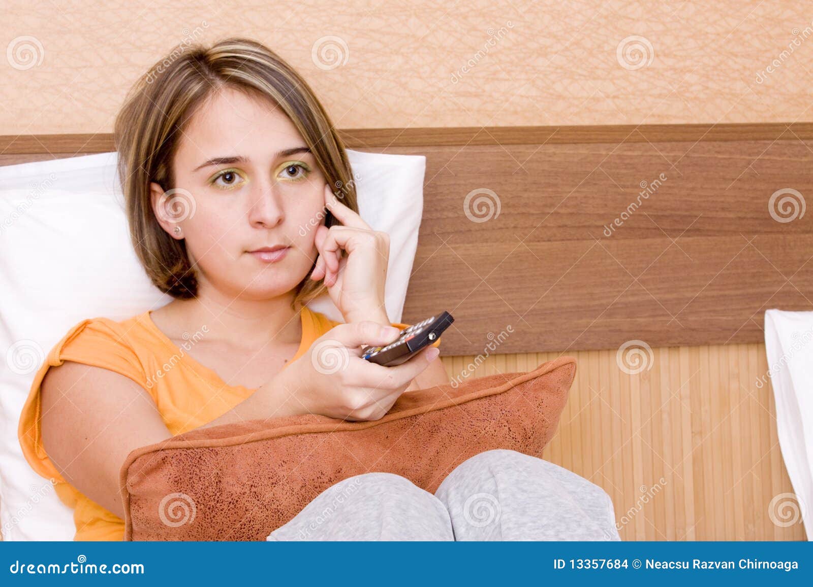 Young Woman with a Remote Control Stock Photo - Image of horizontal ...