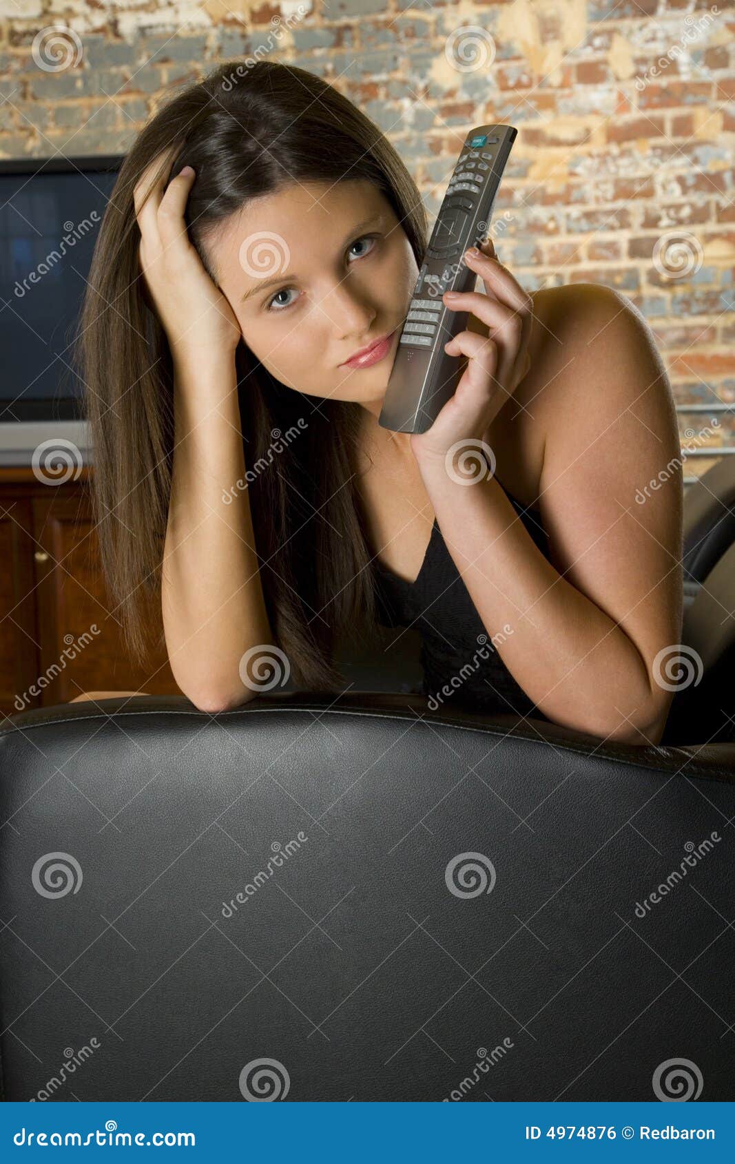 Young Woman and Remote Control Stock Photo - Image of room, caucasian ...