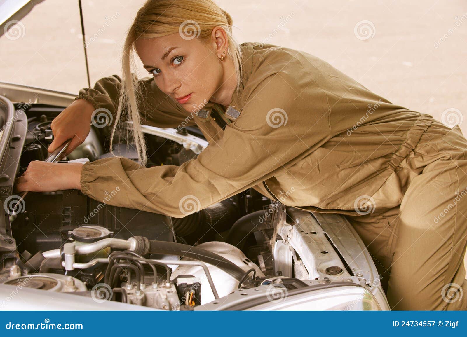 Young woman repairing car stock image. Image of auto - 24734557