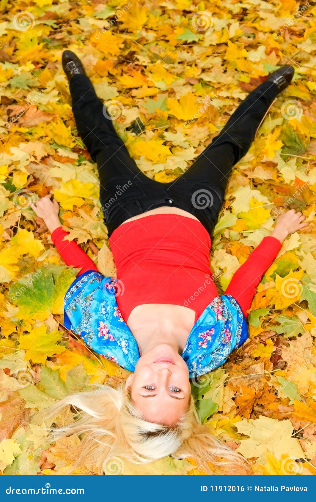 Young Woman Resting on the Ground Stock Photo - Image of adult, autumn ...