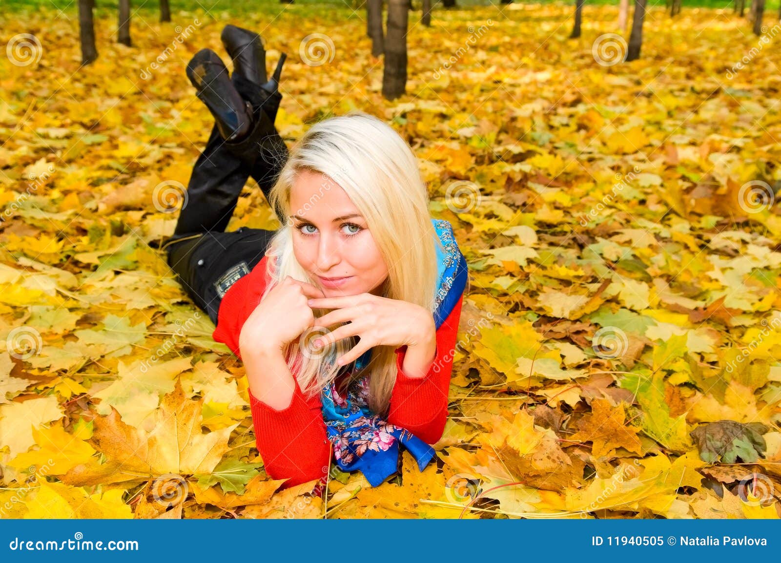 Young Woman Resting on the Ground Stock Image - Image of hair, women ...