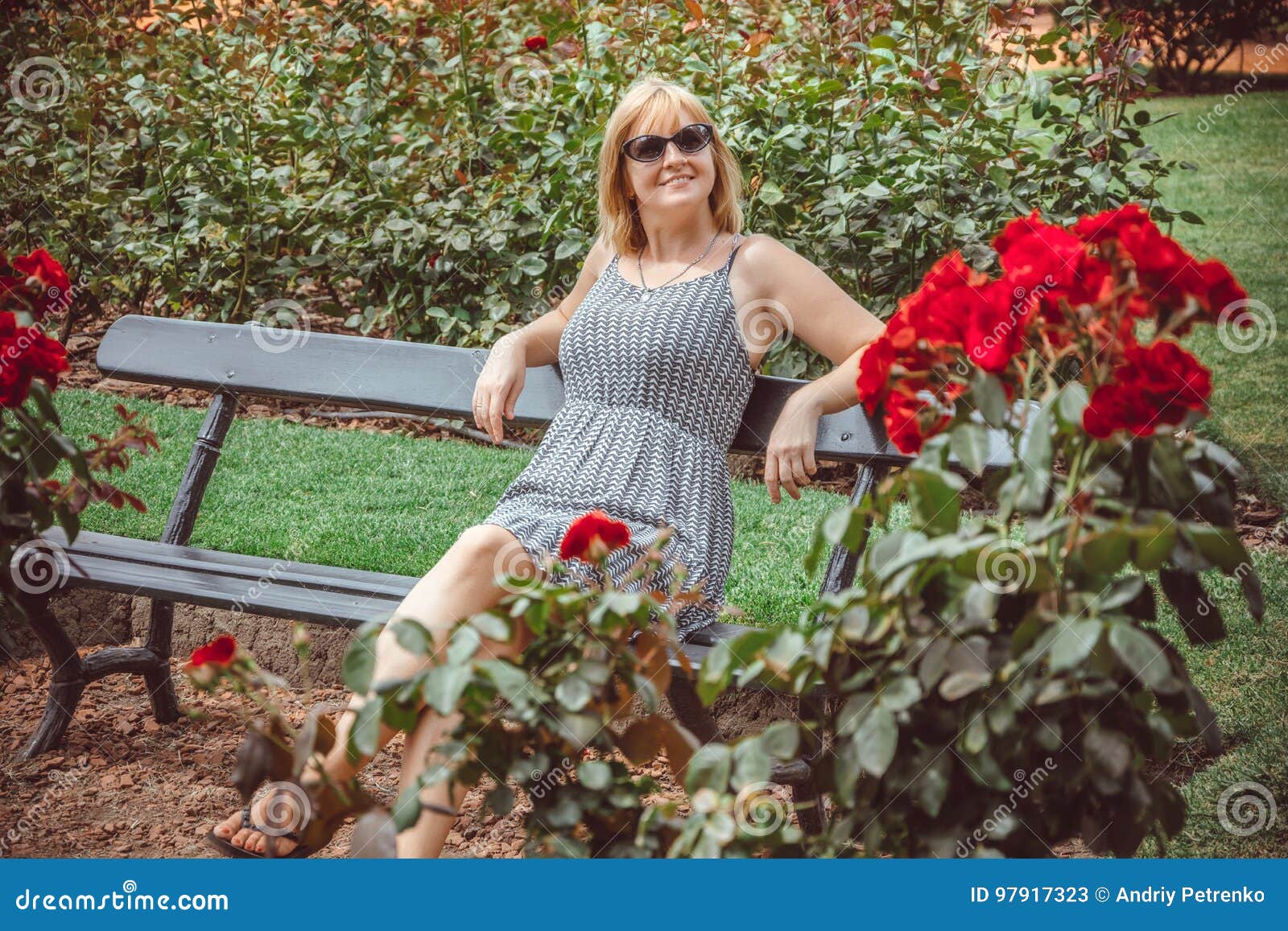 Young Woman Resting in Park Stock Image - Image of gardening, leaf ...