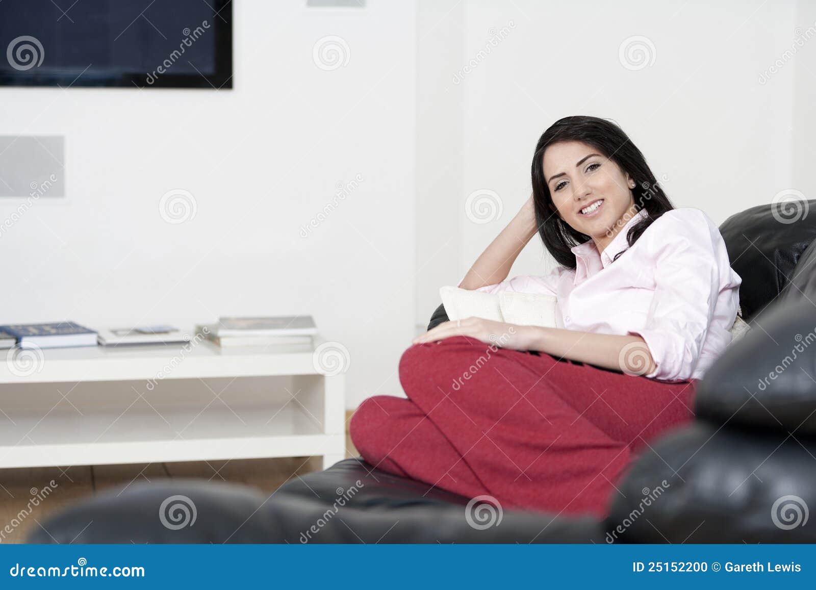 Young Woman Resting on Sofa Stock Photo - Image of girl, modern: 25152200