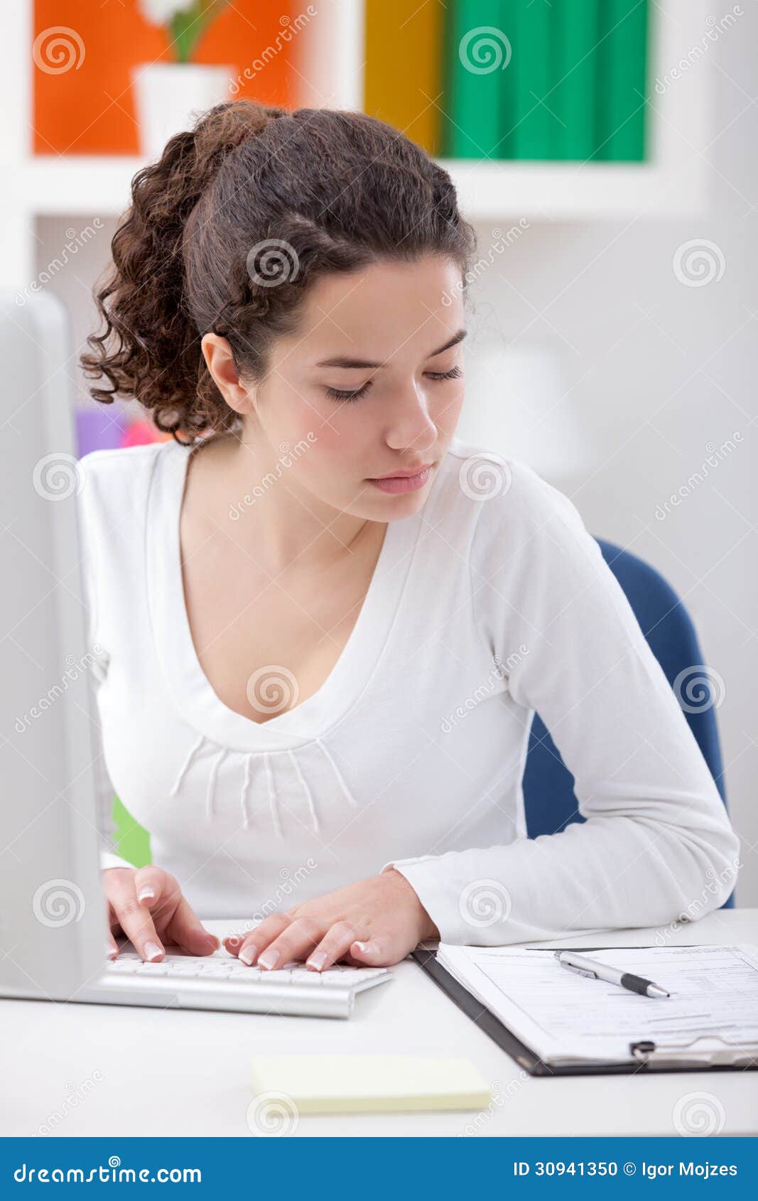 Young Woman Retyping Data into Computer Stock Photo - Image of computer ...